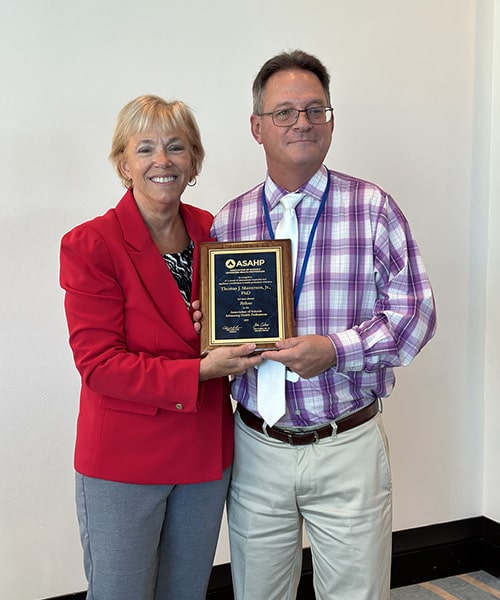Dean Masterson earns Fellow award for contributions to health professions